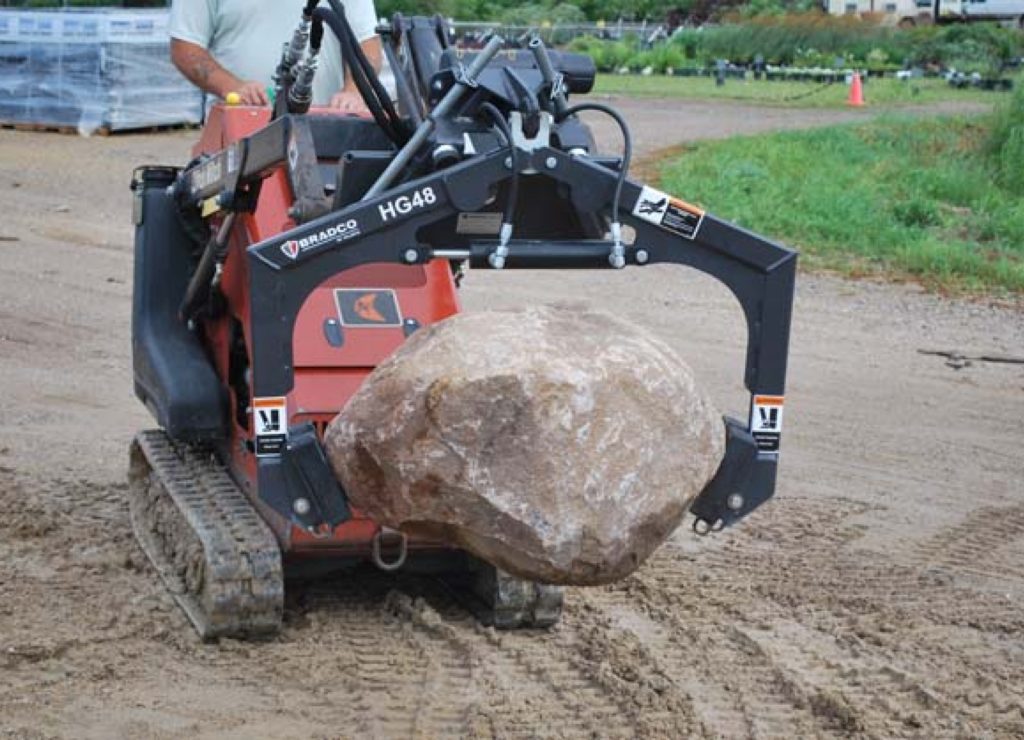 Hardscape Grapple Mini Skid Steer Attachment Rental Lansing, MI